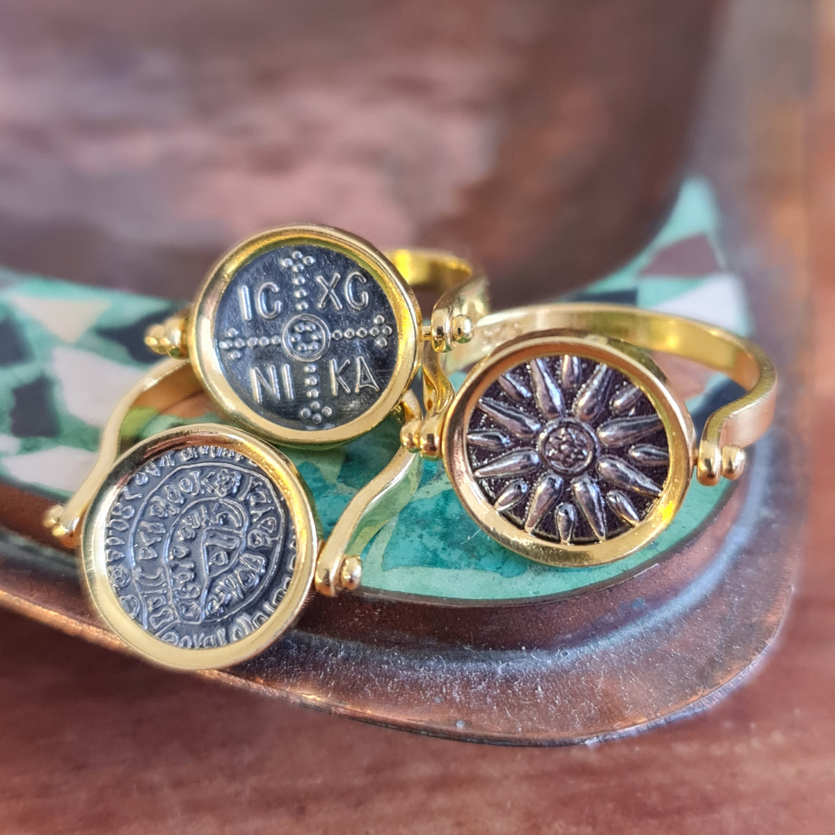 Greek Disc of Phaistos flip ring – Jurnii